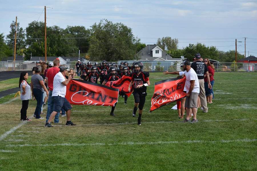 Breakaway Banners – Custom Football Run Through Banners | Signs.com